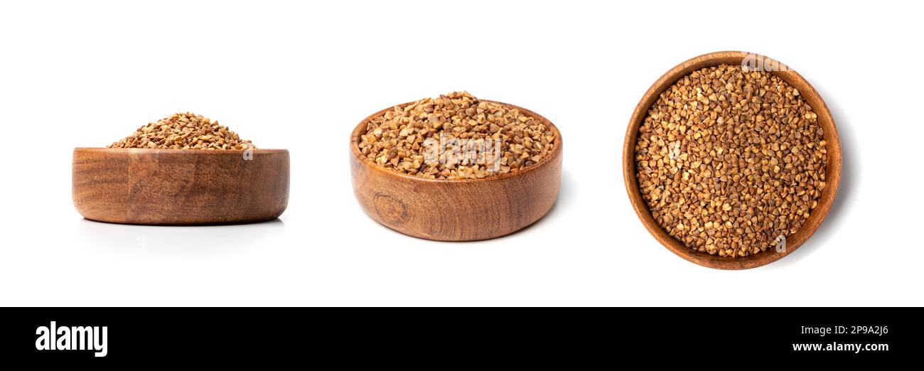 Raw Buckwheat Pile in Wood Bowl Isolated, Dry Buck Wheat Grains ...