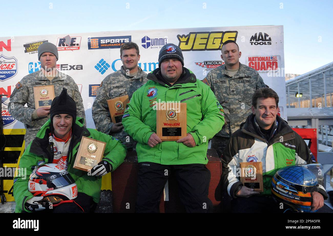 Bodine Bobsled Challenge winner Todd Bodine, center bottom, is flanked ...