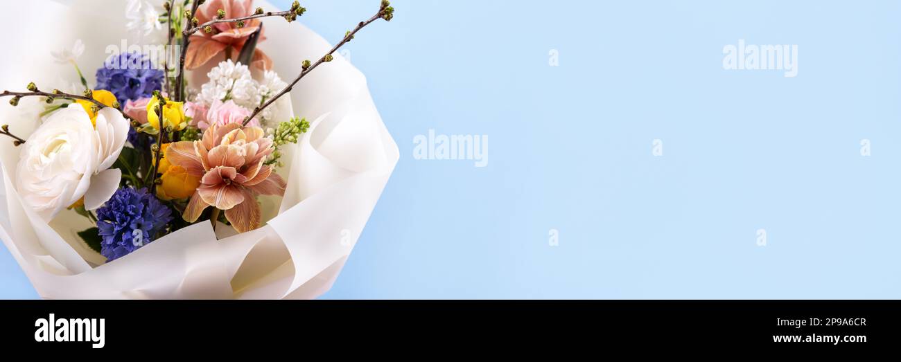 A bright spring bouquet of daffodils, hyacinths, roses, ranunculus ...