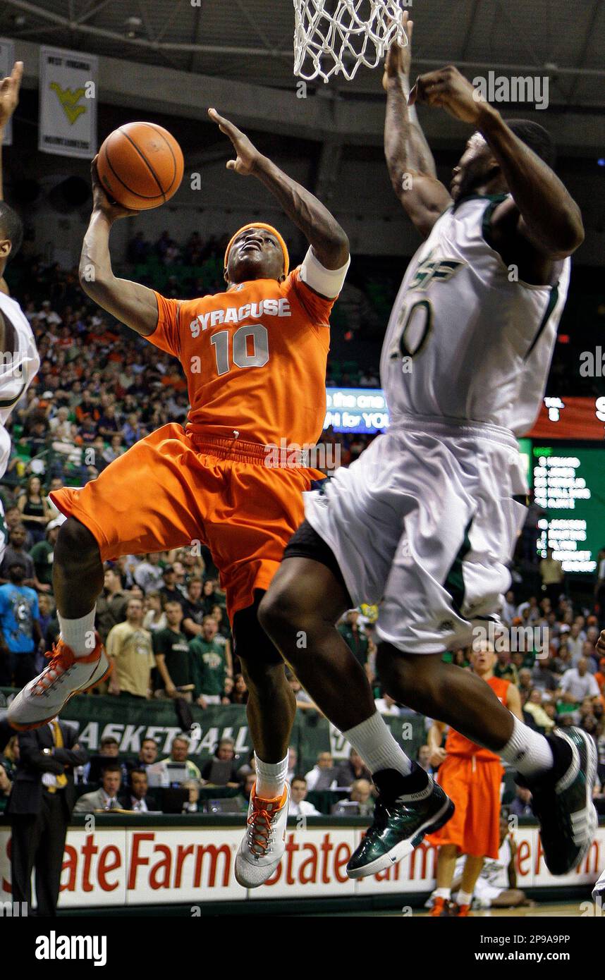 Syracuse guard Jonny Flynn (10) goes up for a shot while being guarded ...