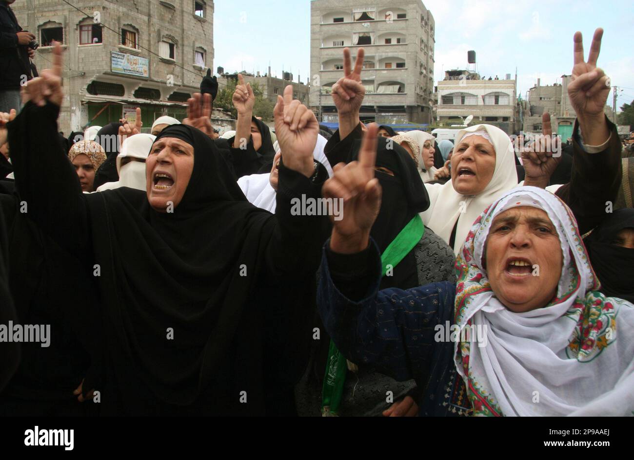 Palestinian women chant slogans during the funeral of Hamas leader ...
