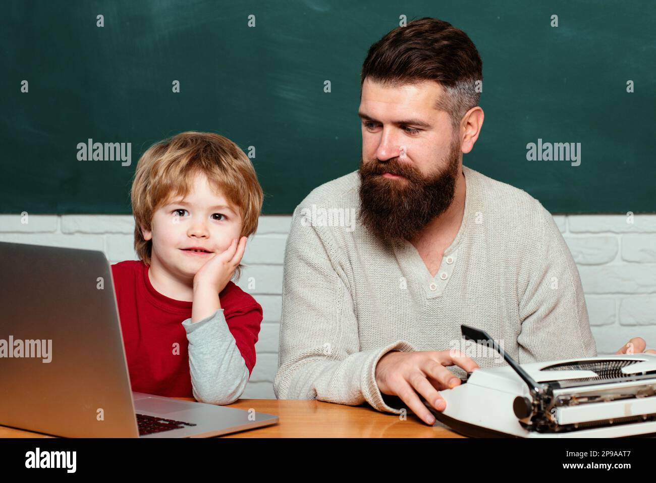 Man teacher play with preschooler child. Man teaches child. father ...