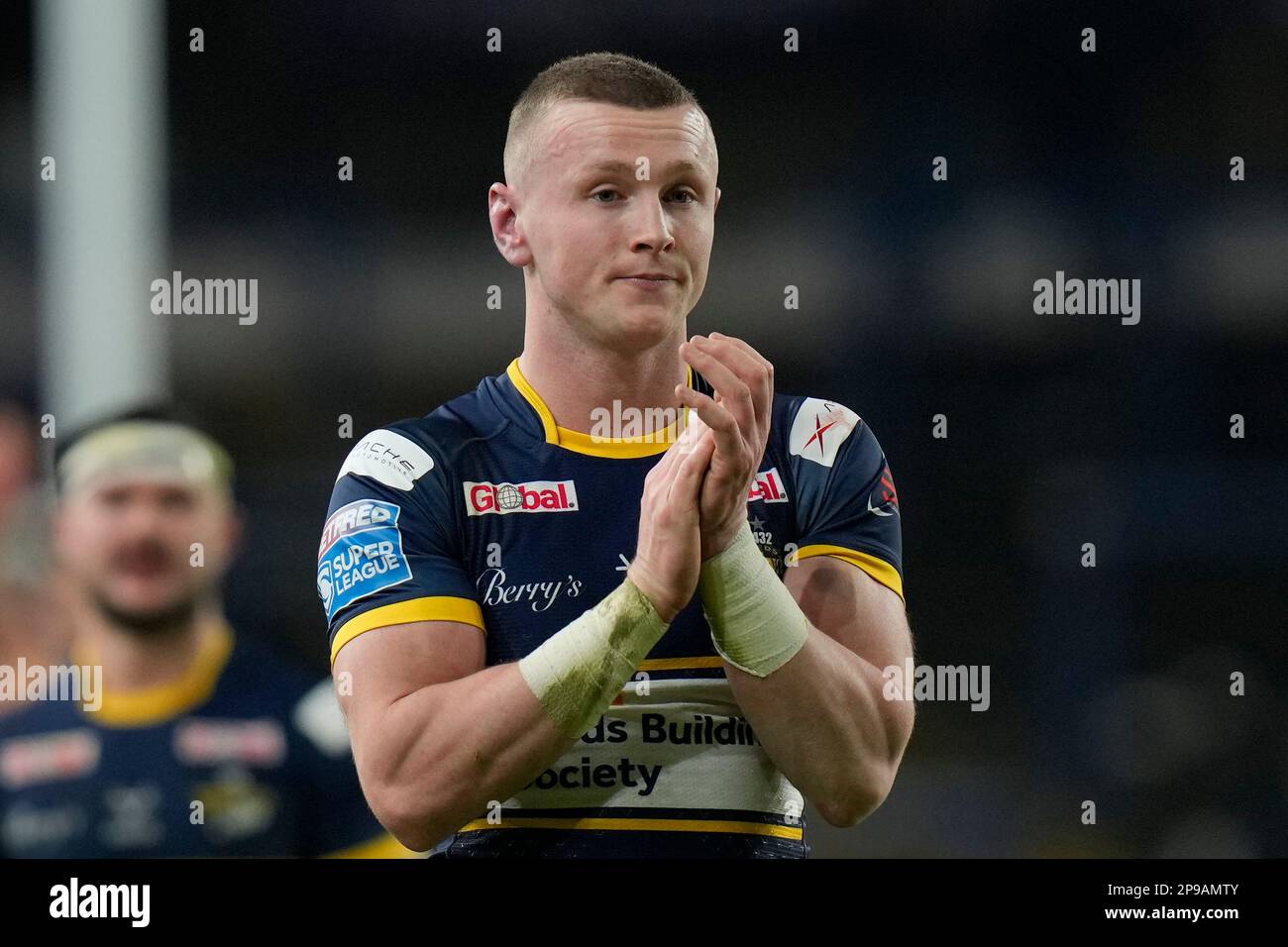 Harry Newman #3 of Leeds Rhinos salutes the fans after the Betfred ...