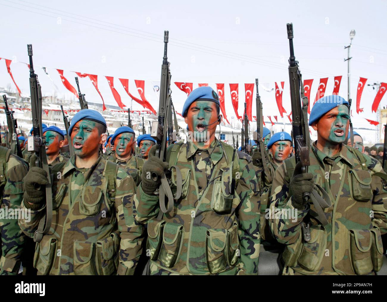 Turkish commandos take part in a ceremony near the town of Sarikamis ...