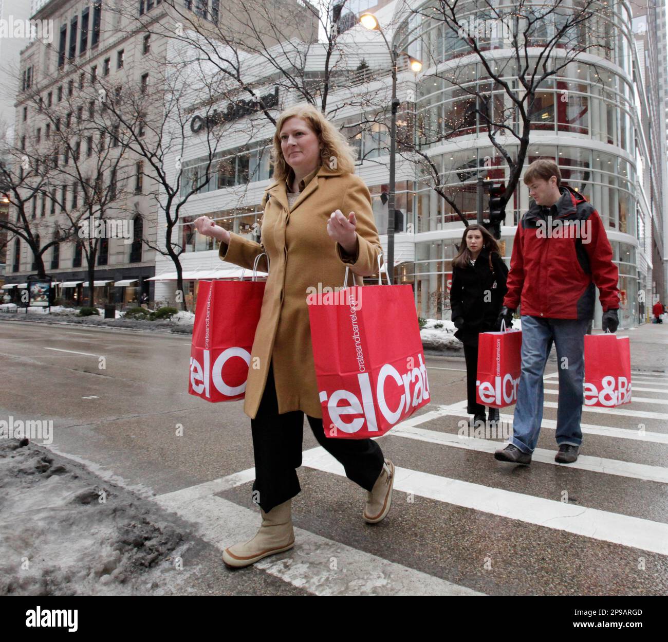 Dawn Ellis, left, from Chicago, leads her brother C.J. Ellis and his ...