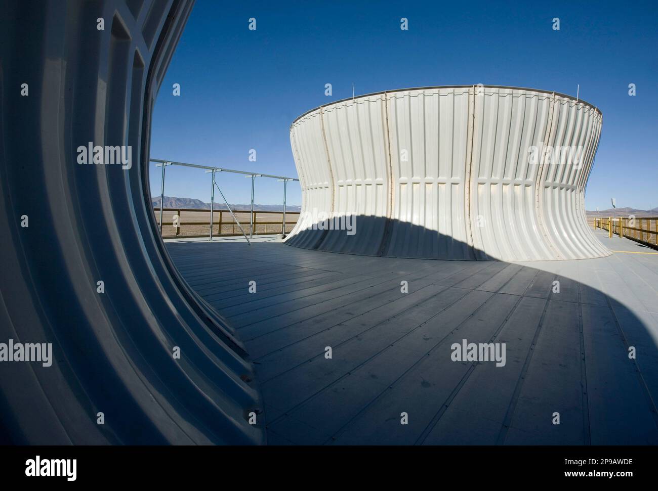 Cooling towers rise above the barren desert at Raser Technologies ...