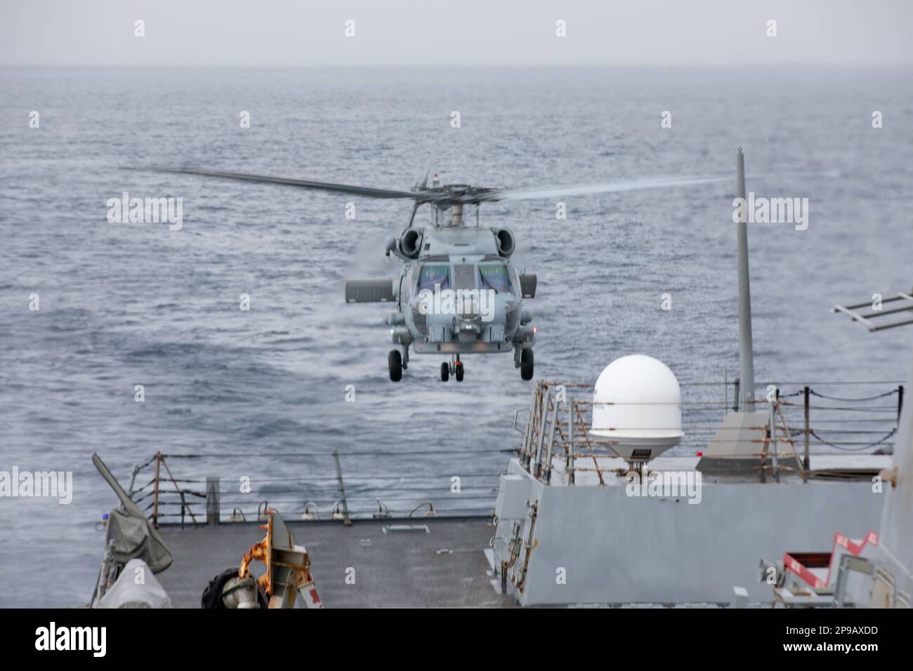 230308-N-WQ732-1002 PACIFIC OCEAN (March 8, 2023) – An MH-60R Seahawk ...