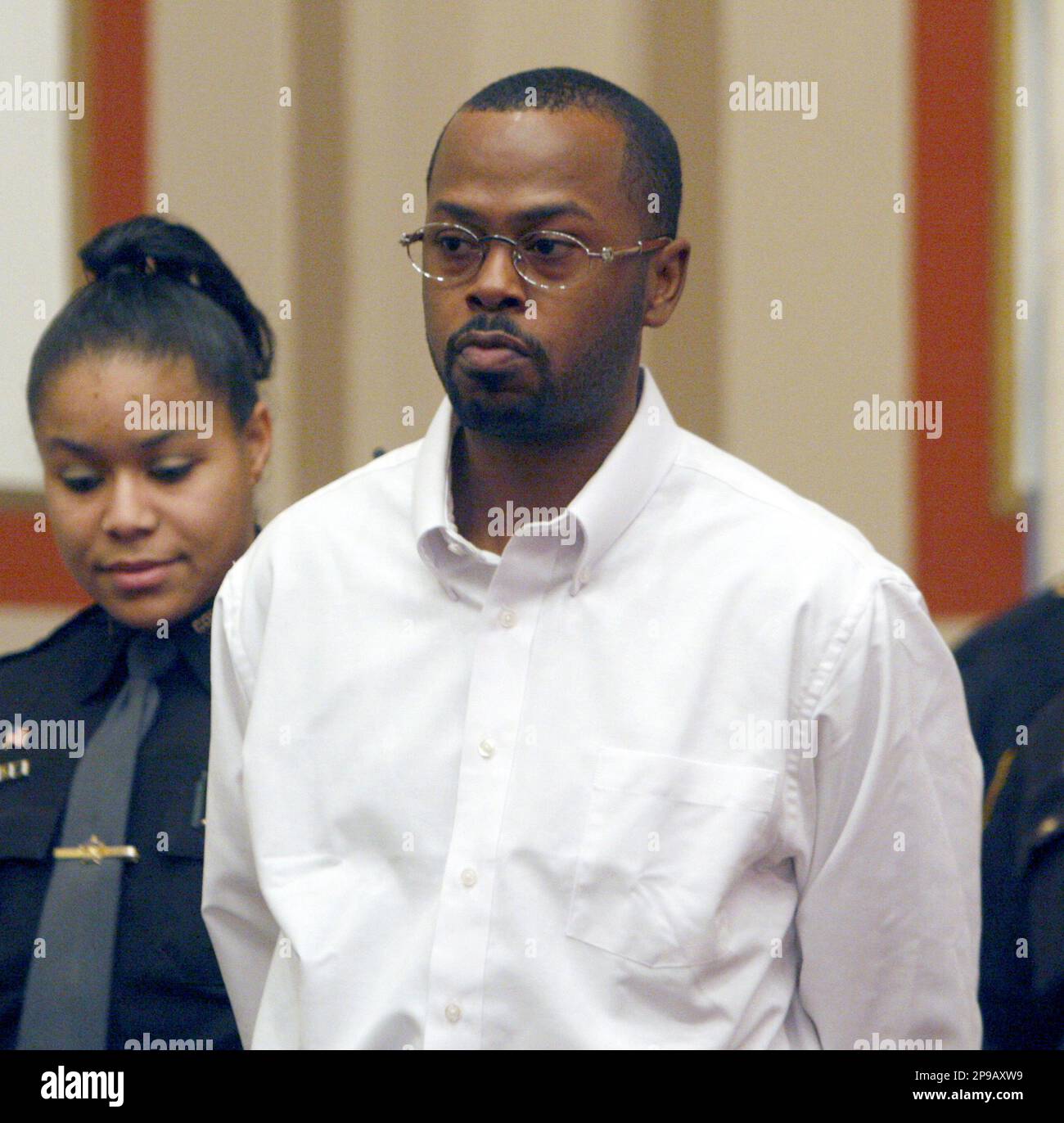 **FILE** This Nov. 21, 2008 file photo shows Hosea Thomas, right, being ...