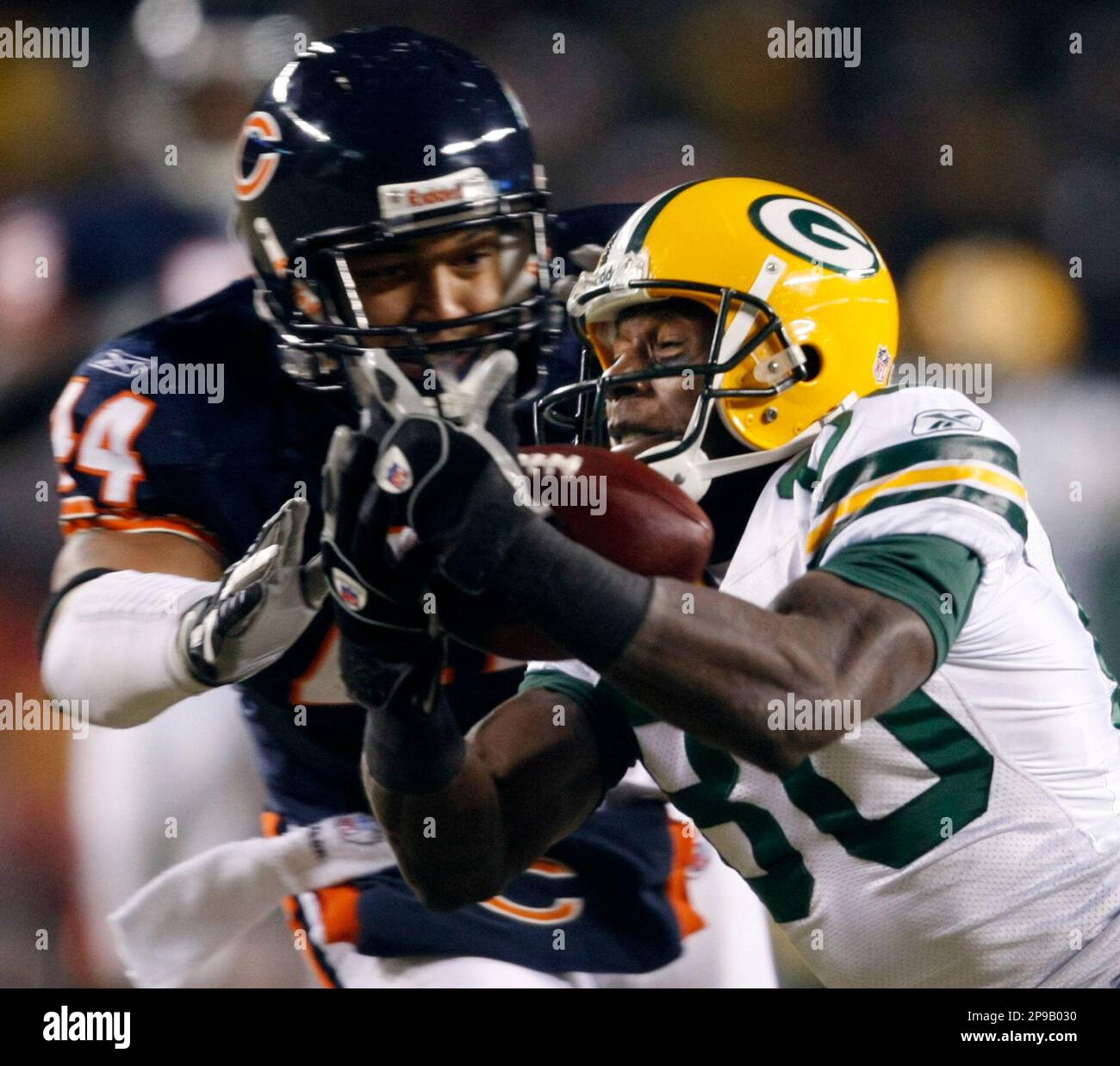 Green Bay Packers wide receiver Donald Driver, right, is unable to ...