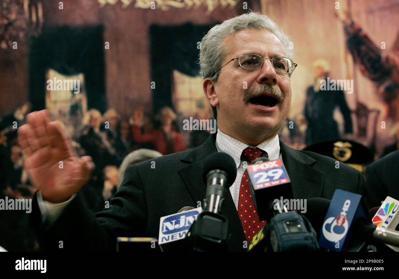 Acting U.S. Attorney Ralph J. Marra Jr., gestures as he answers a ...