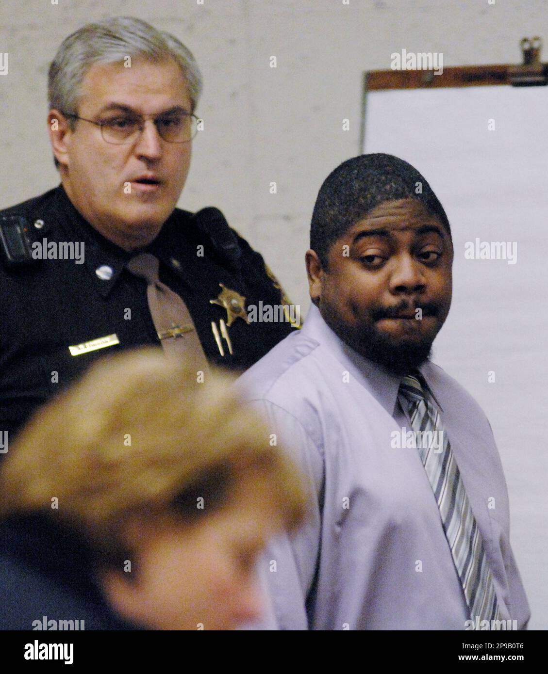 Convicted killer Michael Addison looks around the Hillsborough County ...