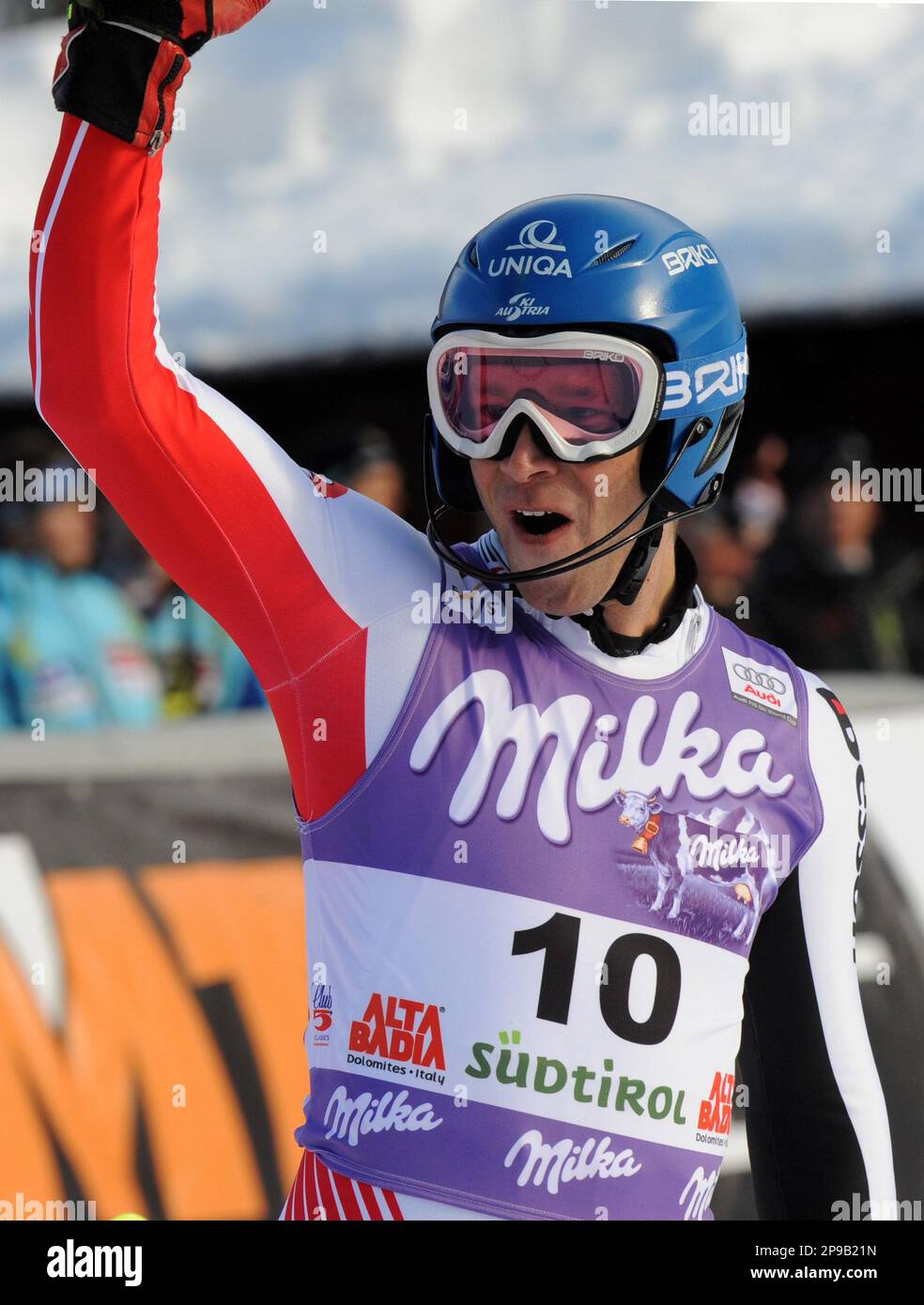 Benjamin Raich, of Austria, celebrates at finish line after taking ...
