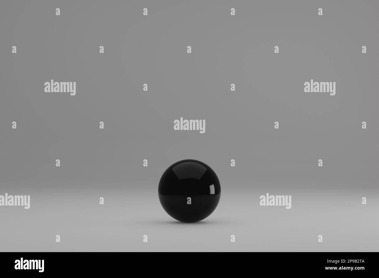This 3D rendered image features a black ball with a glossy reflection ...