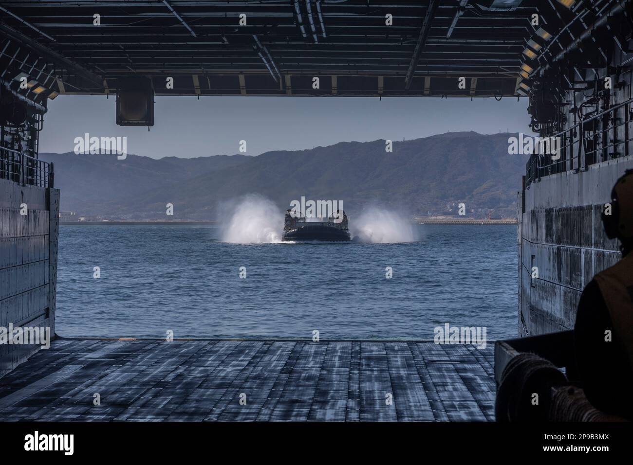 Sailors with the Japan Maritime Self-Defense Force prepare to board the ...