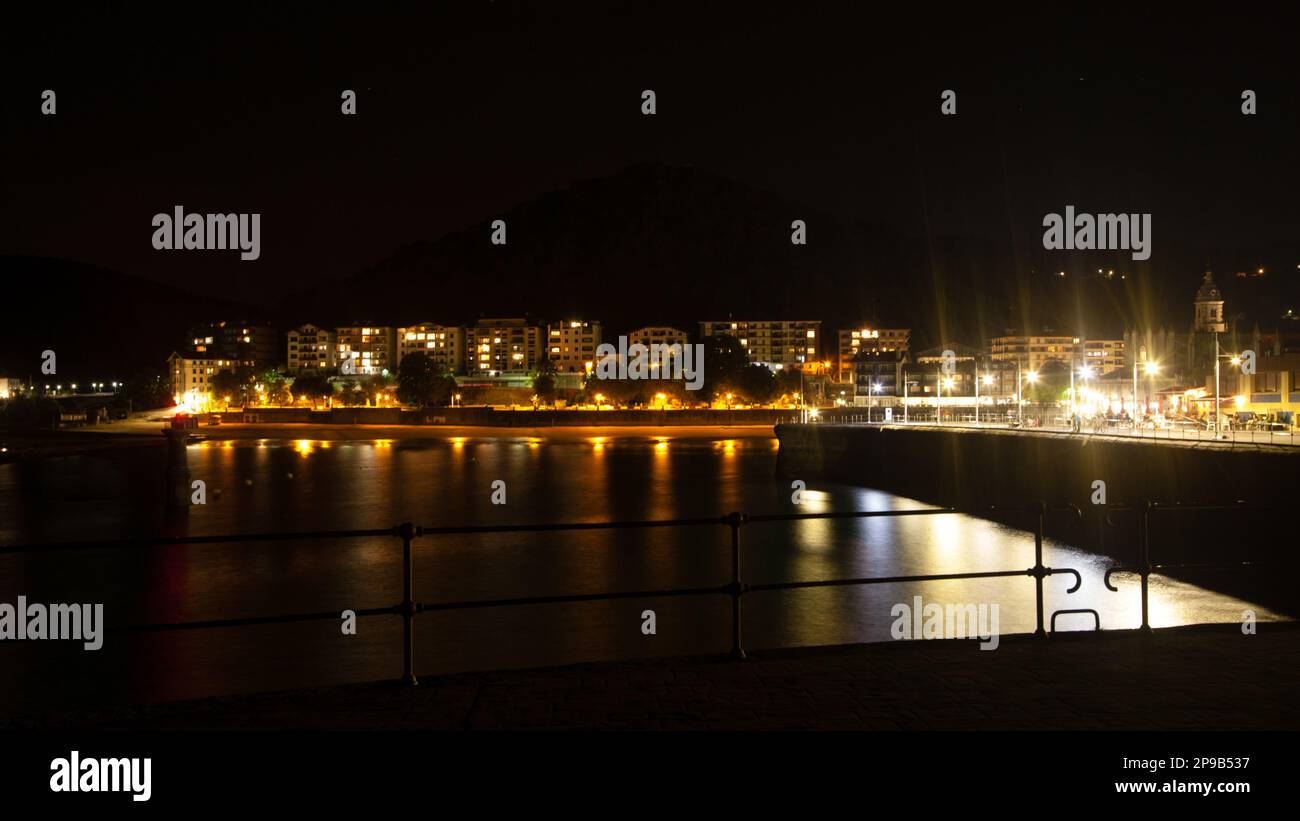 Lekeitio town night view from pier. Basque autonomous community, Spain ...