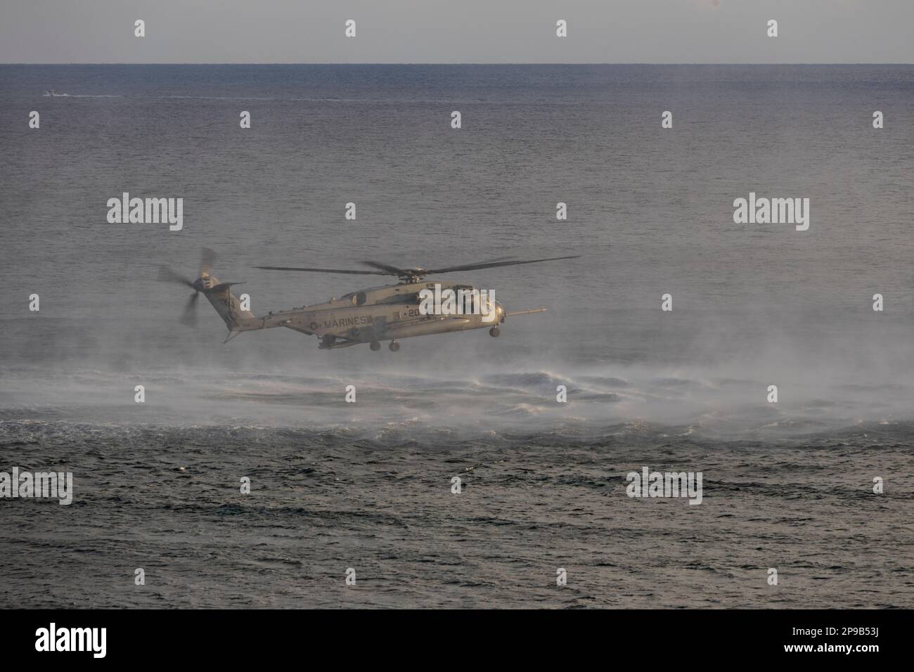 A U.S. Marine Corps CH-53E Super Stallion with Marine Medium Tiltrotor ...