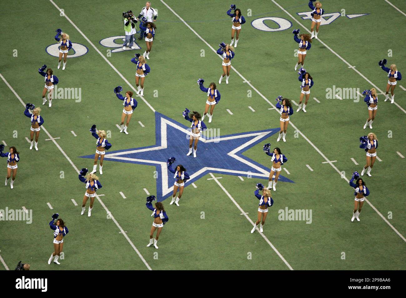 The Dallas Cowboys Cheerleaders perform before the start of an NFL ...