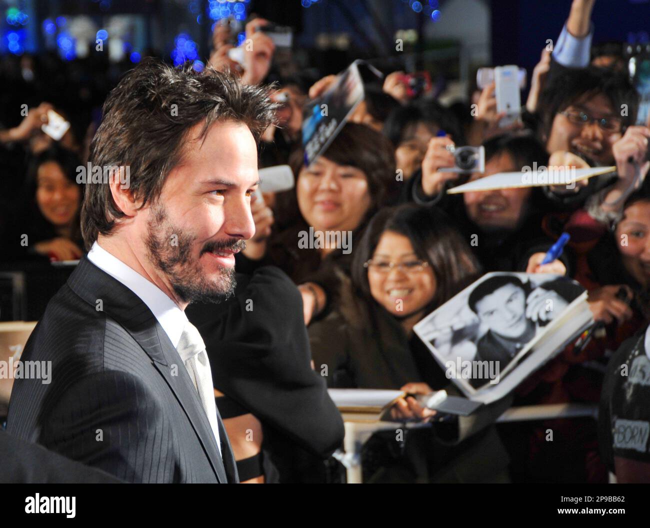 Actor Keanu Reeves is welcomed by Japanese fans during Japan premier of ...