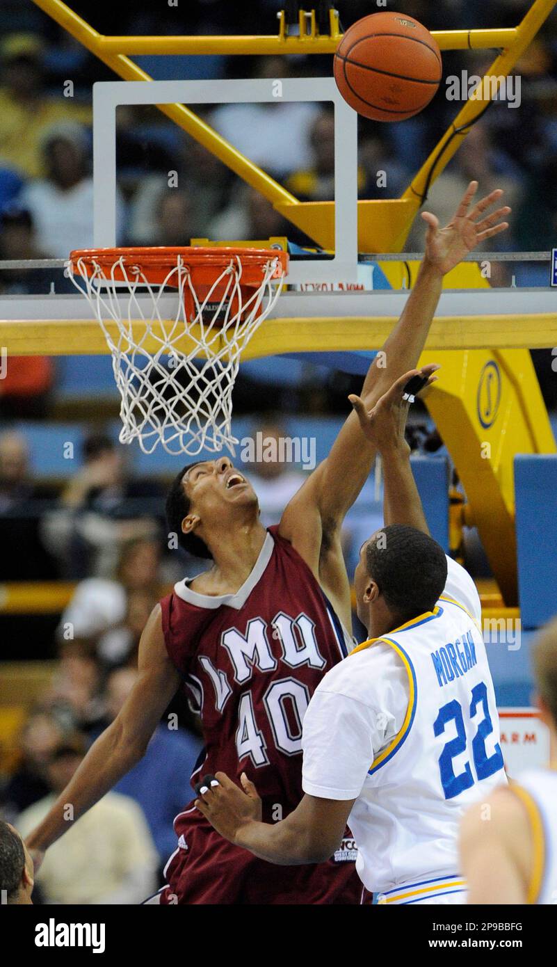 UCLA center J'Mison Morgan (22) shoots over Loyola Marymount forward ...