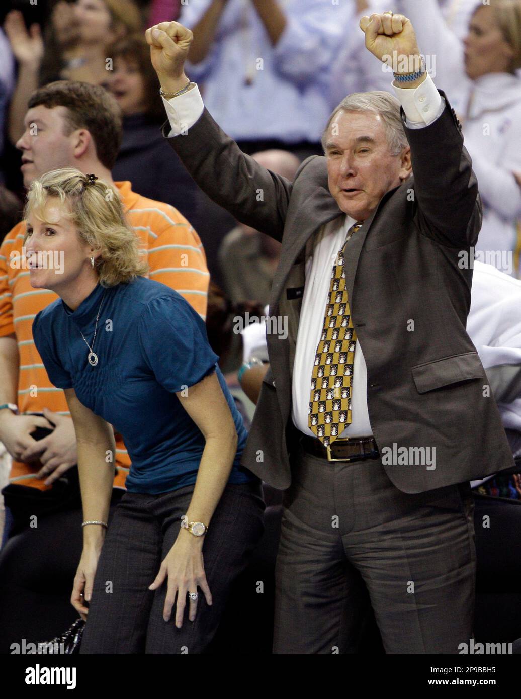 New Orleans Hornets owner George Shinn, right, with his wife Denise ...