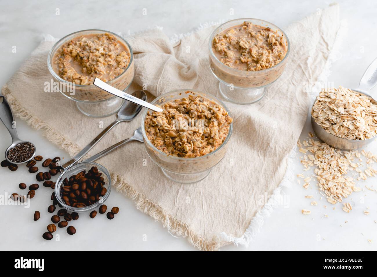 Three Dishes of Vanilla Cold Brew Overnight Oats: Small glass bowls of ...