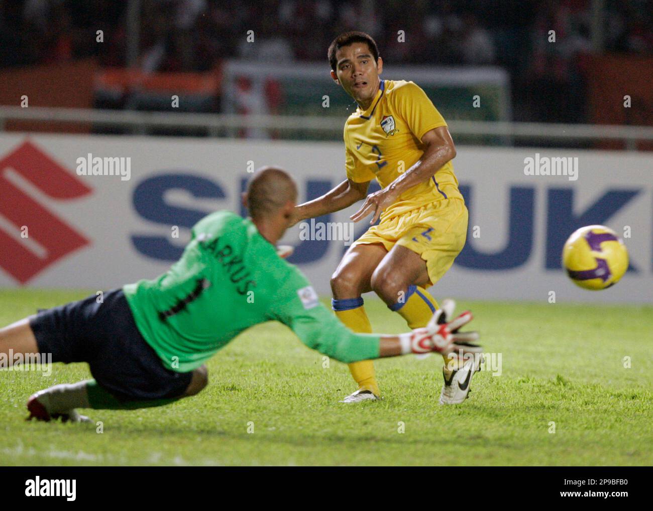 Indonesia's goalkeeper Markus Horison Rihihina (1) tries to stop the ...