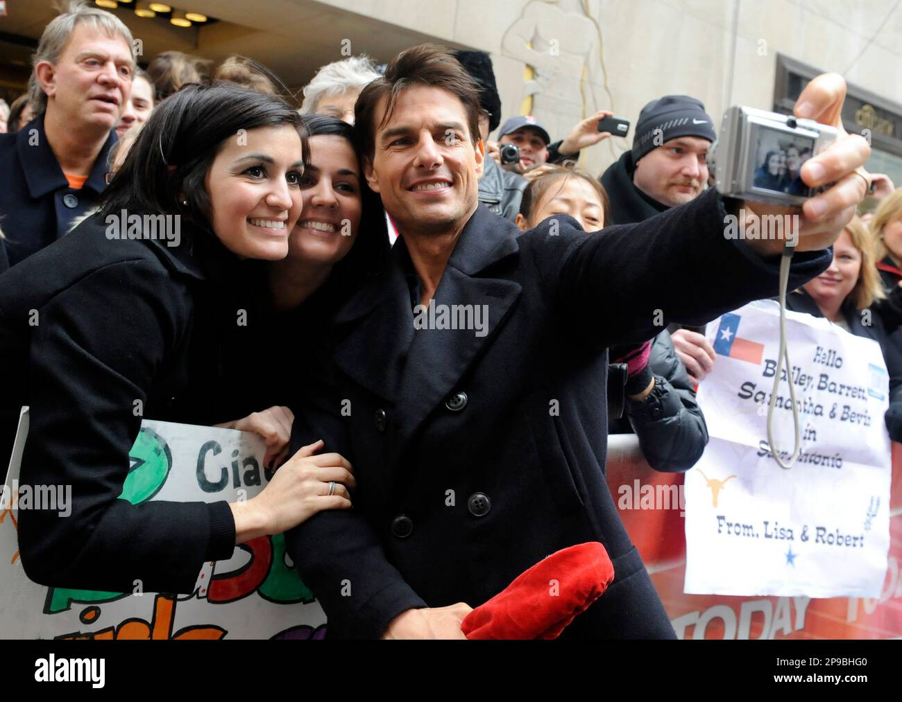 Actor Tom Cruise poses for photos with audience members in New York's ...