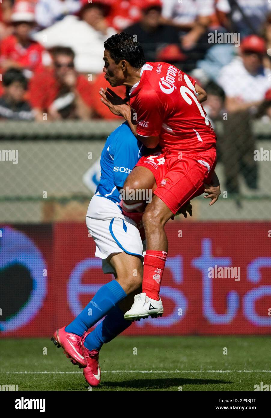 Toluca's Jose Manuel Cruzalta, front left, collides with Cruz Azul's ...