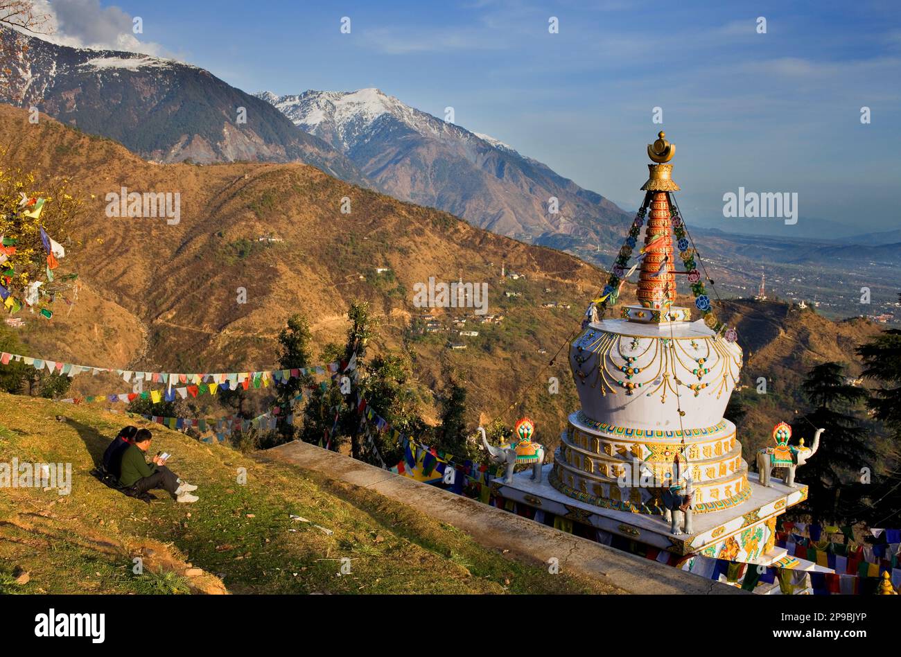 Stupa in Lhagyal Ri,near Tsuglagkhang complex.In background the ...