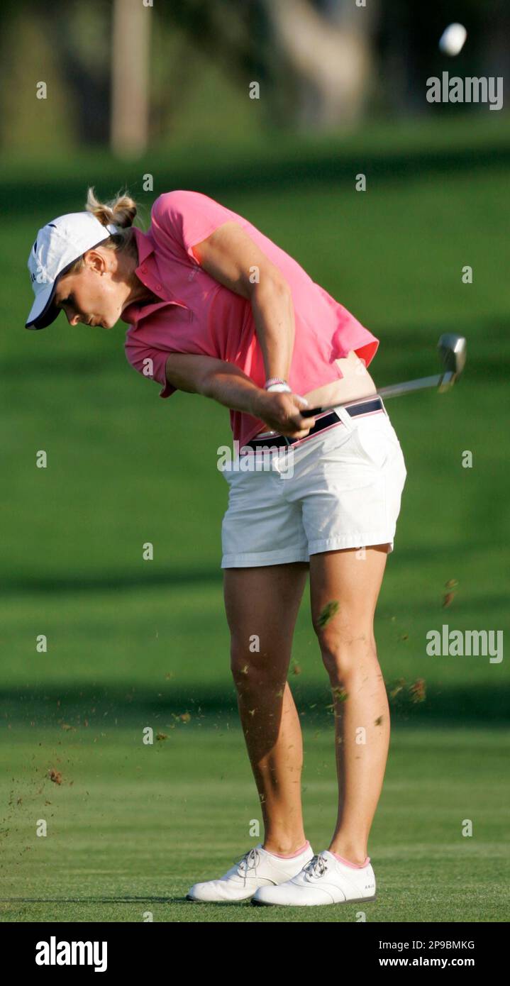 Germany's Anja Monke plays a shot on the 18th hole during the final day ...
