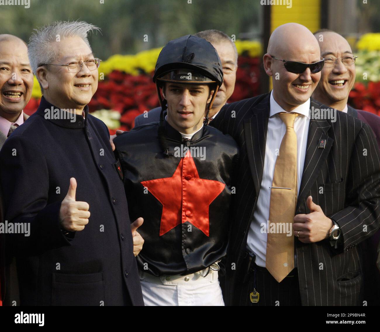 From left, owner of Hong Kong's horse Good Ba Ba, John Yuen Se Kit ...
