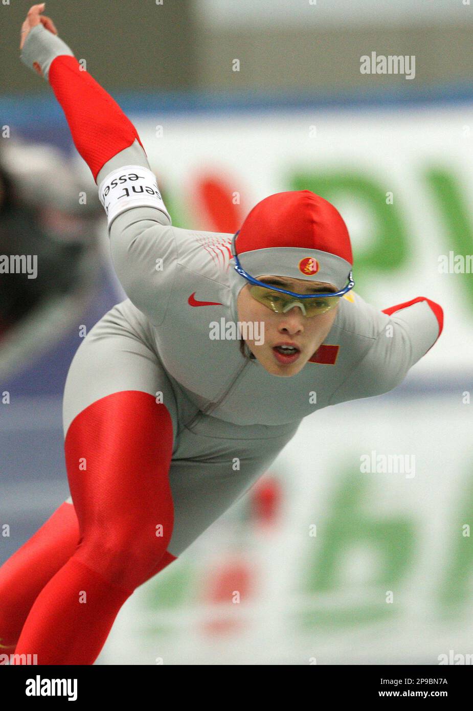 Yu Jing of China strains to take a second place during the women's ...