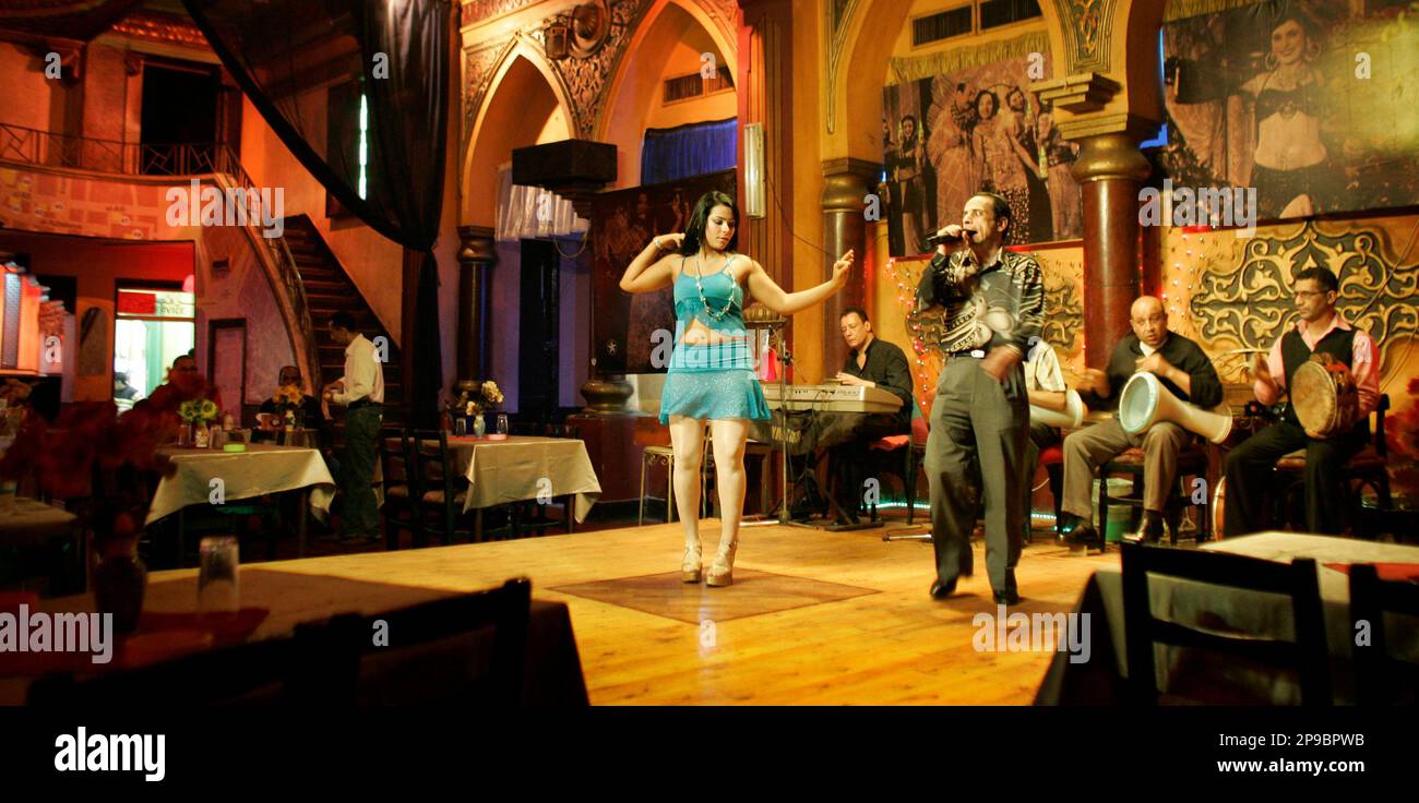 A belly dancer performs at the Shahrazad nightclub in downtown Cairo ...