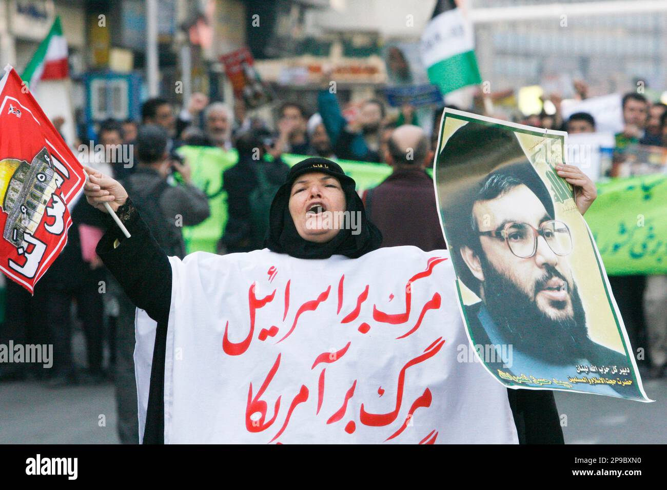 Wearing a white shroud, indicating her readiness for martyrdom, and ...
