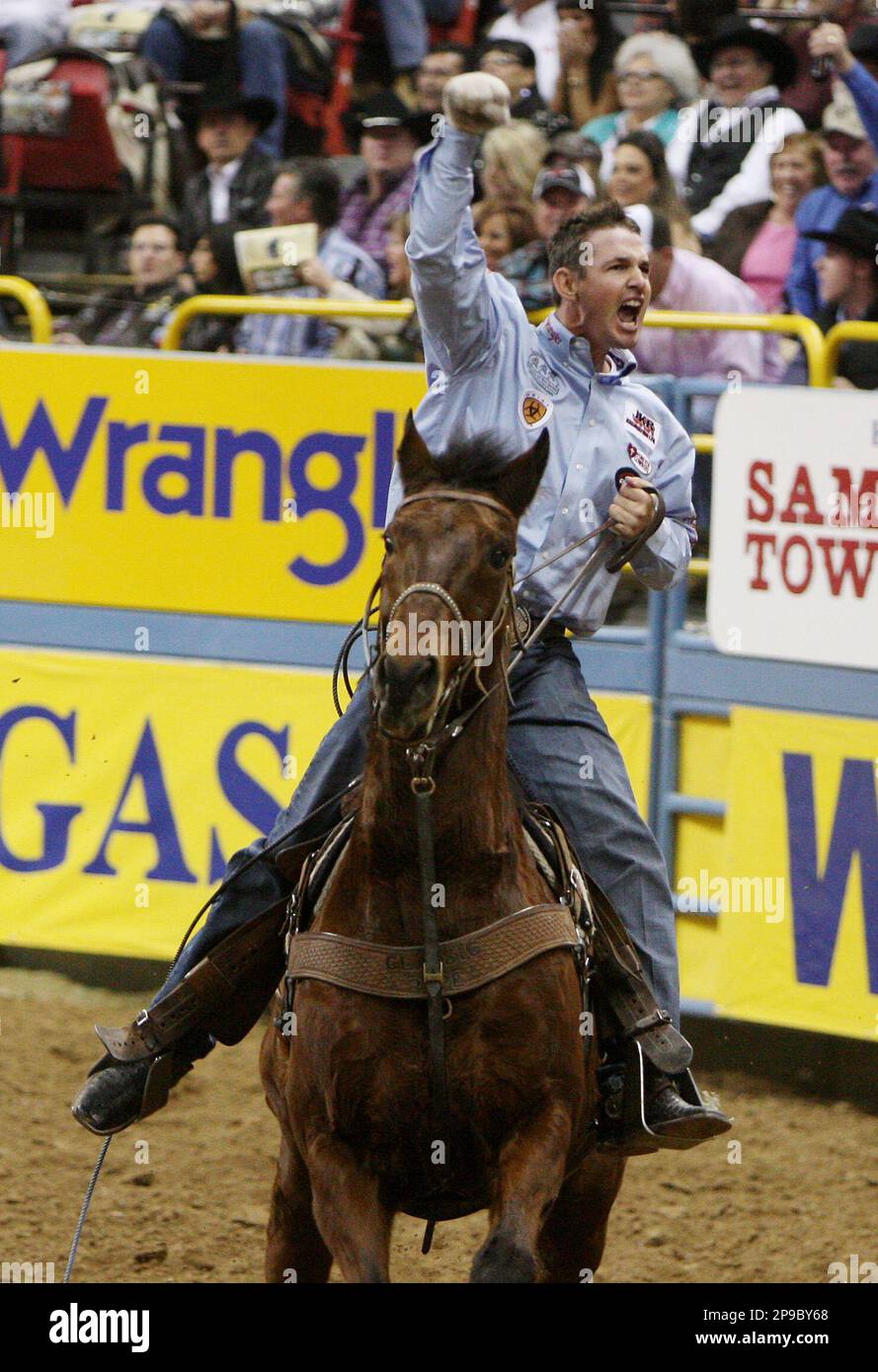 Travis Tryan, of Billings, Mont., celebrates tying the world record in ...