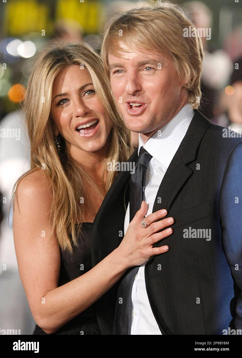 Actress Jennifer Aniston, left, and actor Owen Wilson pose on the press ...