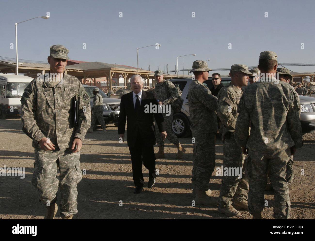U.S. Defense Secretary Robert Gates arrives at Kandahar Air Field in ...