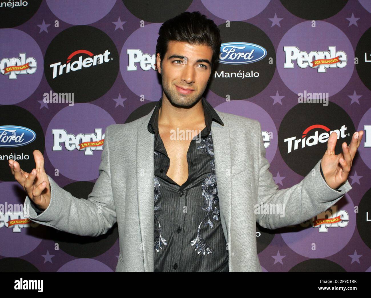 Actor and singer Jencarlos Canela gestures as he poses for ...
