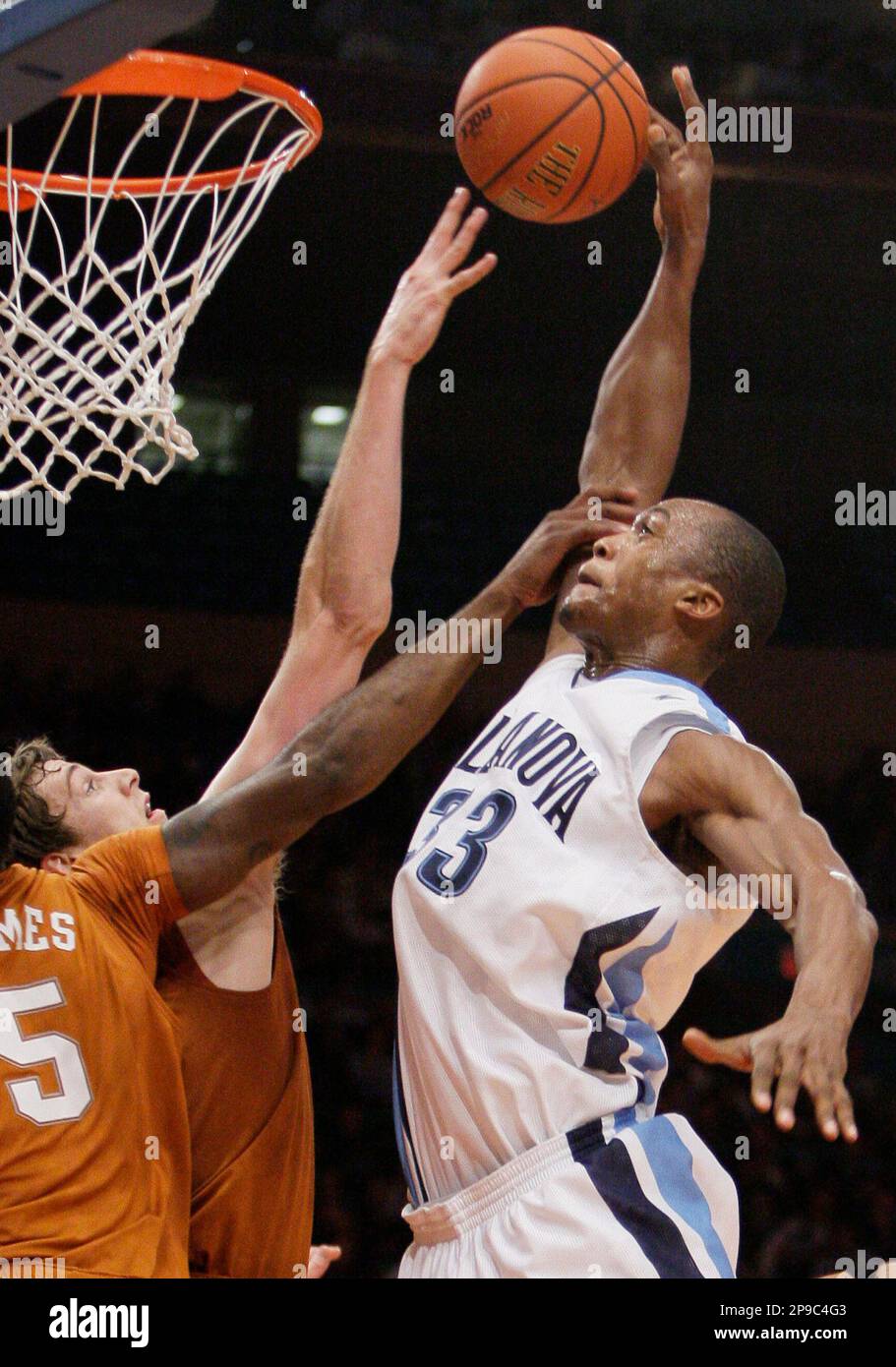 Villanova's Dante Cunningham, right, is fouled by Texas' Damion James ...