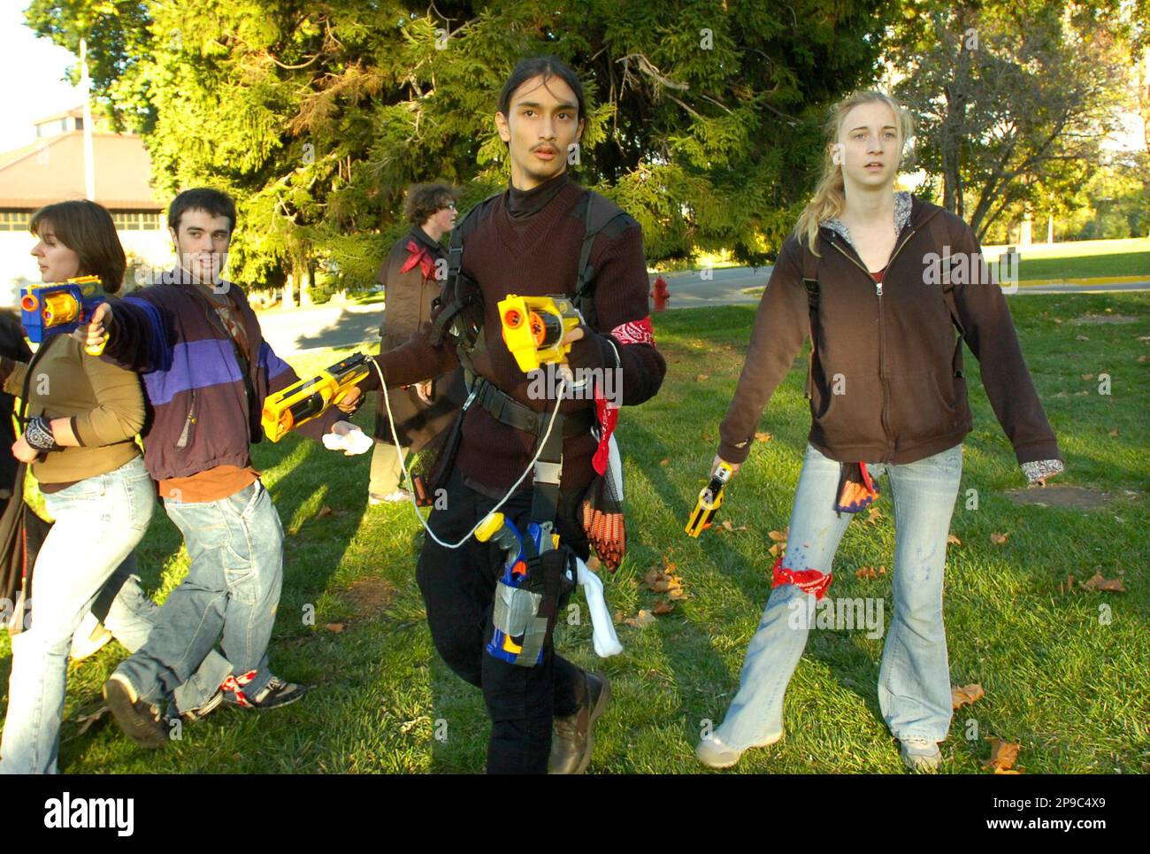 "Humans," Sutton Ashby, center, and Claire Swanson, right, watch as ...
