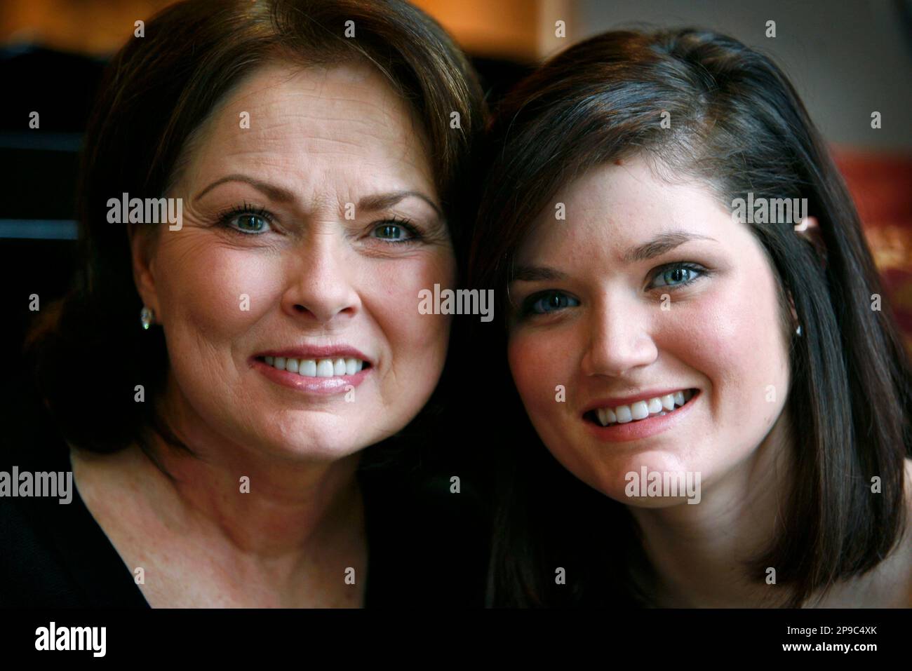 Cindy Sabbag, of West Des Moines, Iowa, left, sits with her daughter ...