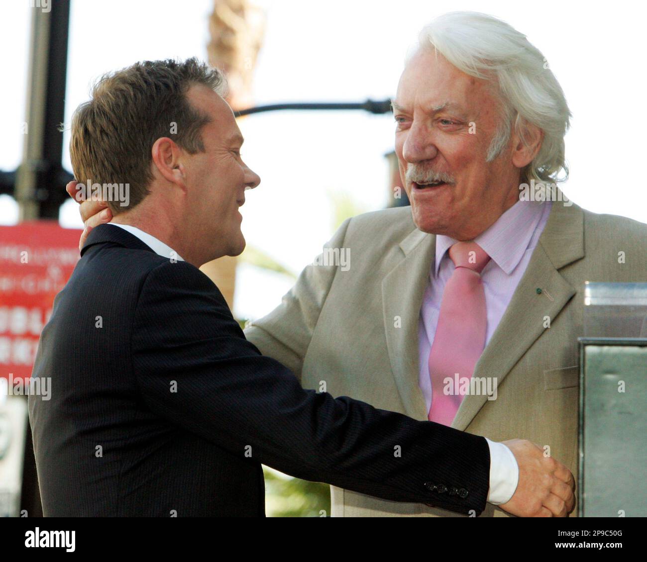 Kiefer Sutherland, left, and his father actor Donald Sutherland embrace ...