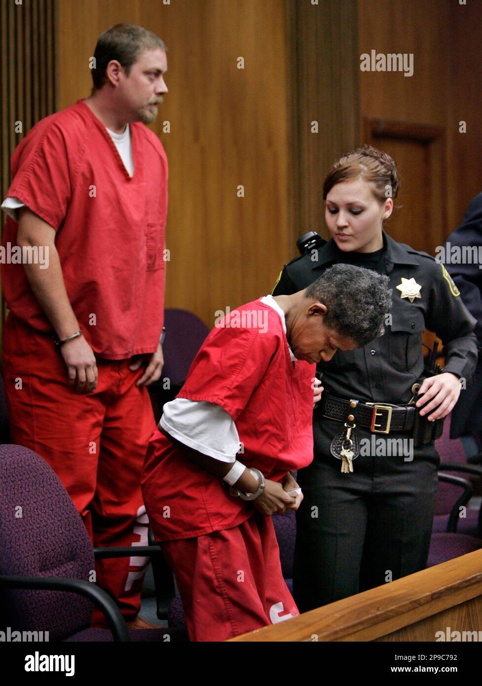 Caren Ramirez, 43, center, and Michael Schumacher, left, appears in a ...