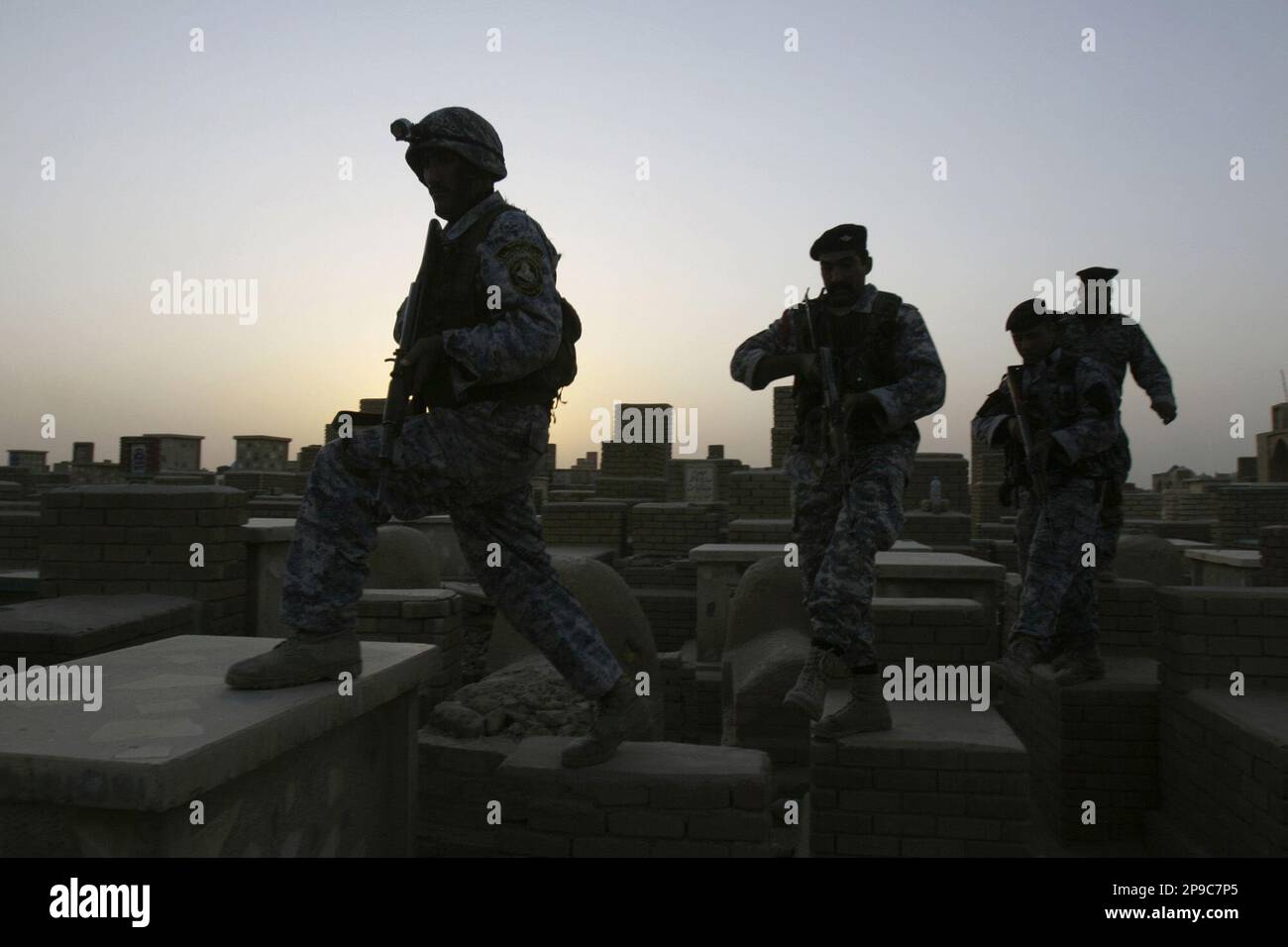 Iraqi police patrols Wadi-us-Salaam, The Valley of Peace, cemetery in ...