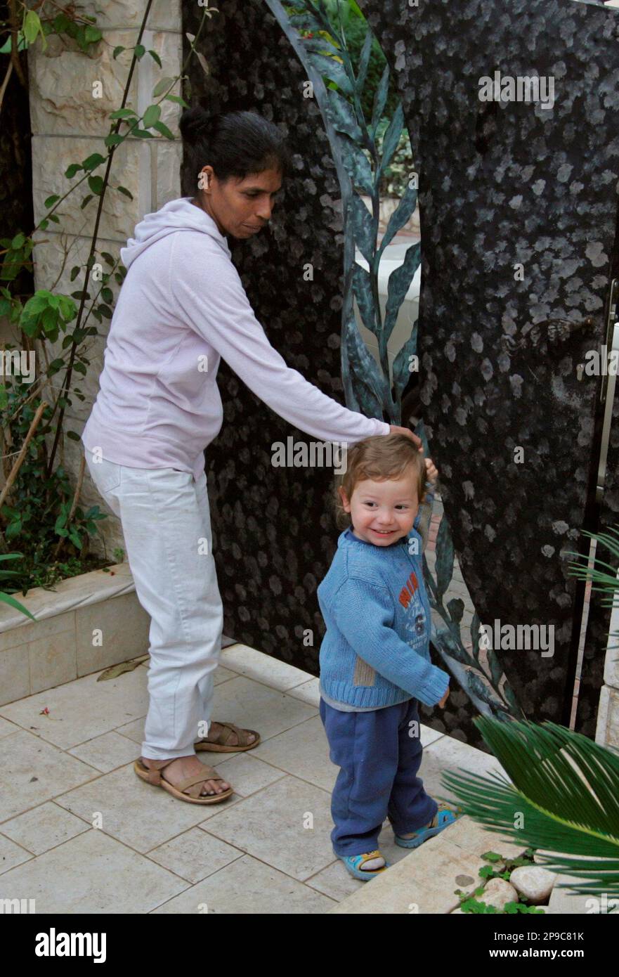 Indian nanny Sandra Samuel plays with Moshe Holtzberg, 2, orphan of ...
