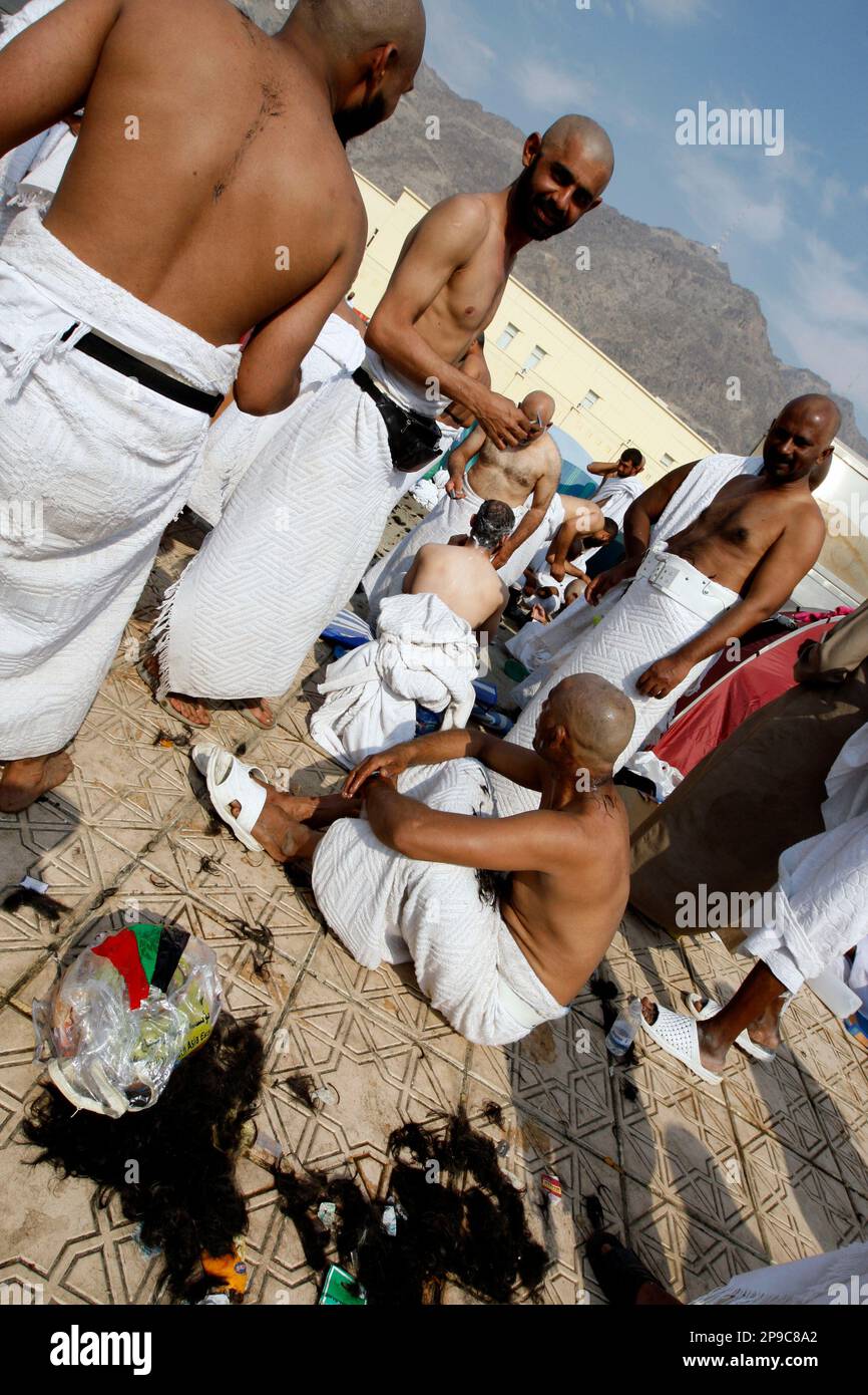 Muslim pilgrims smile after they had their heads shaved after throwing ...