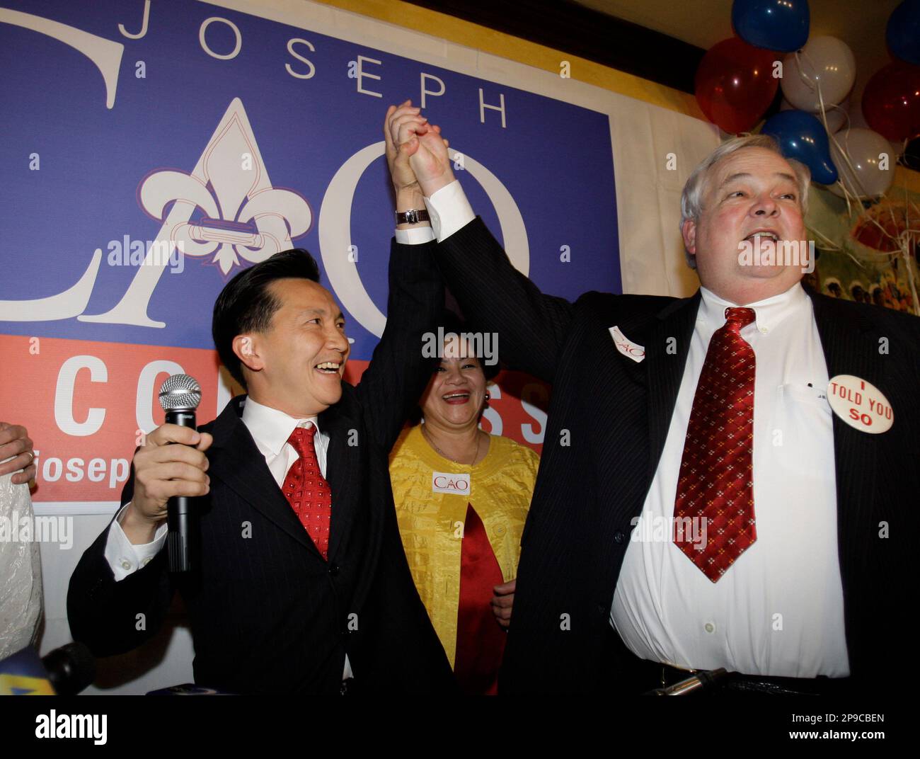Republican Anh 'Joseph' Cao, left, smiles with his senior advisor Bryan ...