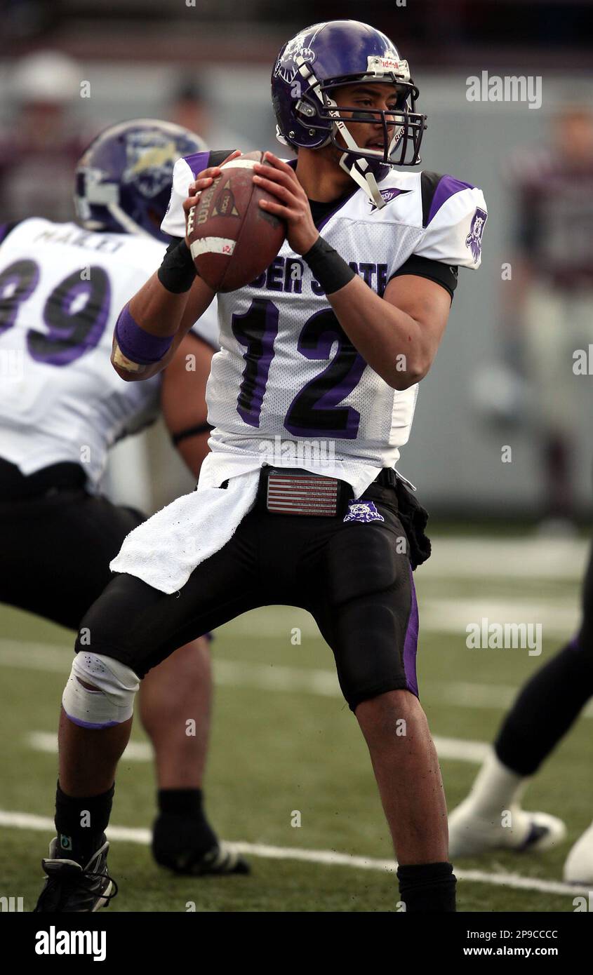 Weber State quarterback Cameron Higgins appears in first-quarter action ...