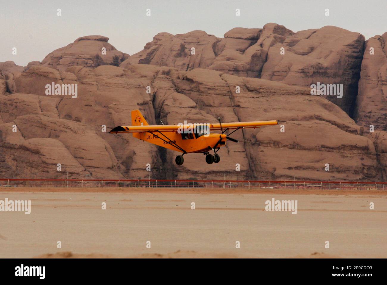 An Ultra light plane lands at the desert of Wadi Rum, South of Jordan ...