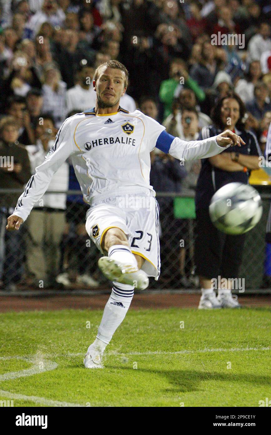 Football star David Beckham takes a corner kick for the LA Galaxy ...